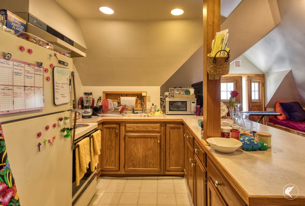 30 Academy St., Saranac Lake NY 12983 | Merrill L. Thomas